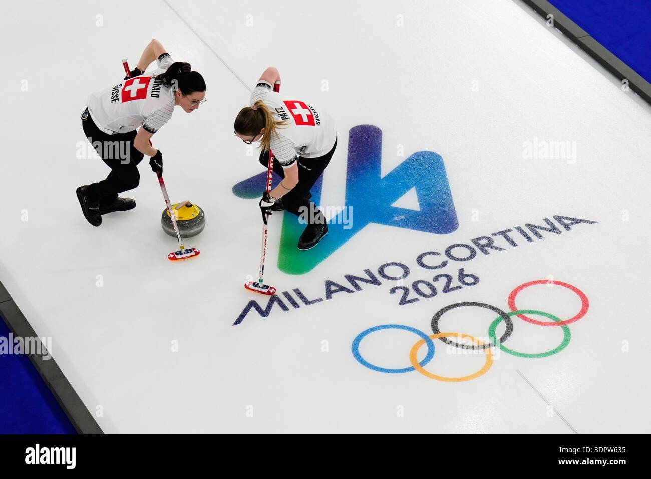 Switzerland's Alina Paetz and Carole Howald compete during a women's ...