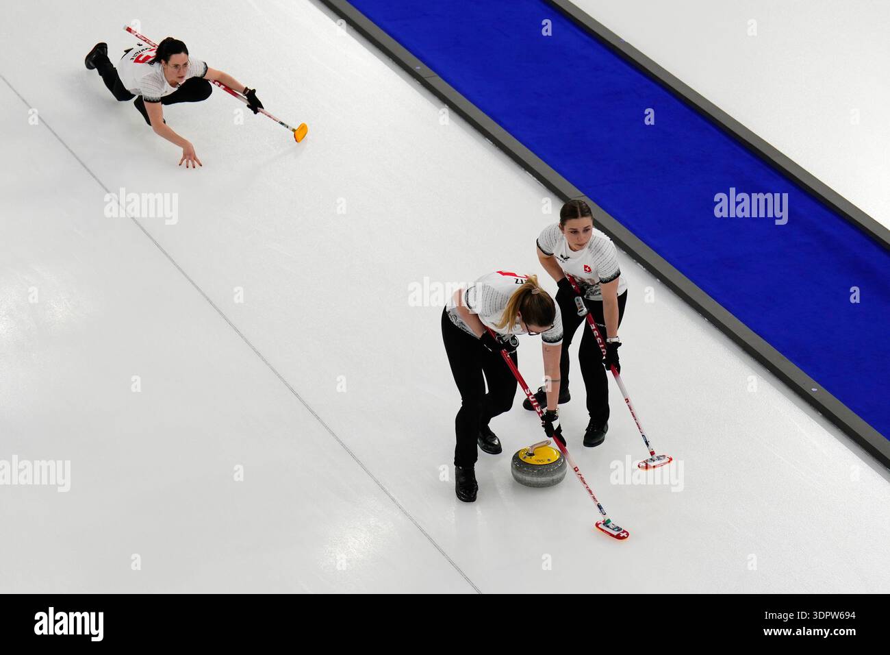 Switzerland's Alina Paetz, Carole Howald and Selina Witschonke compete ...