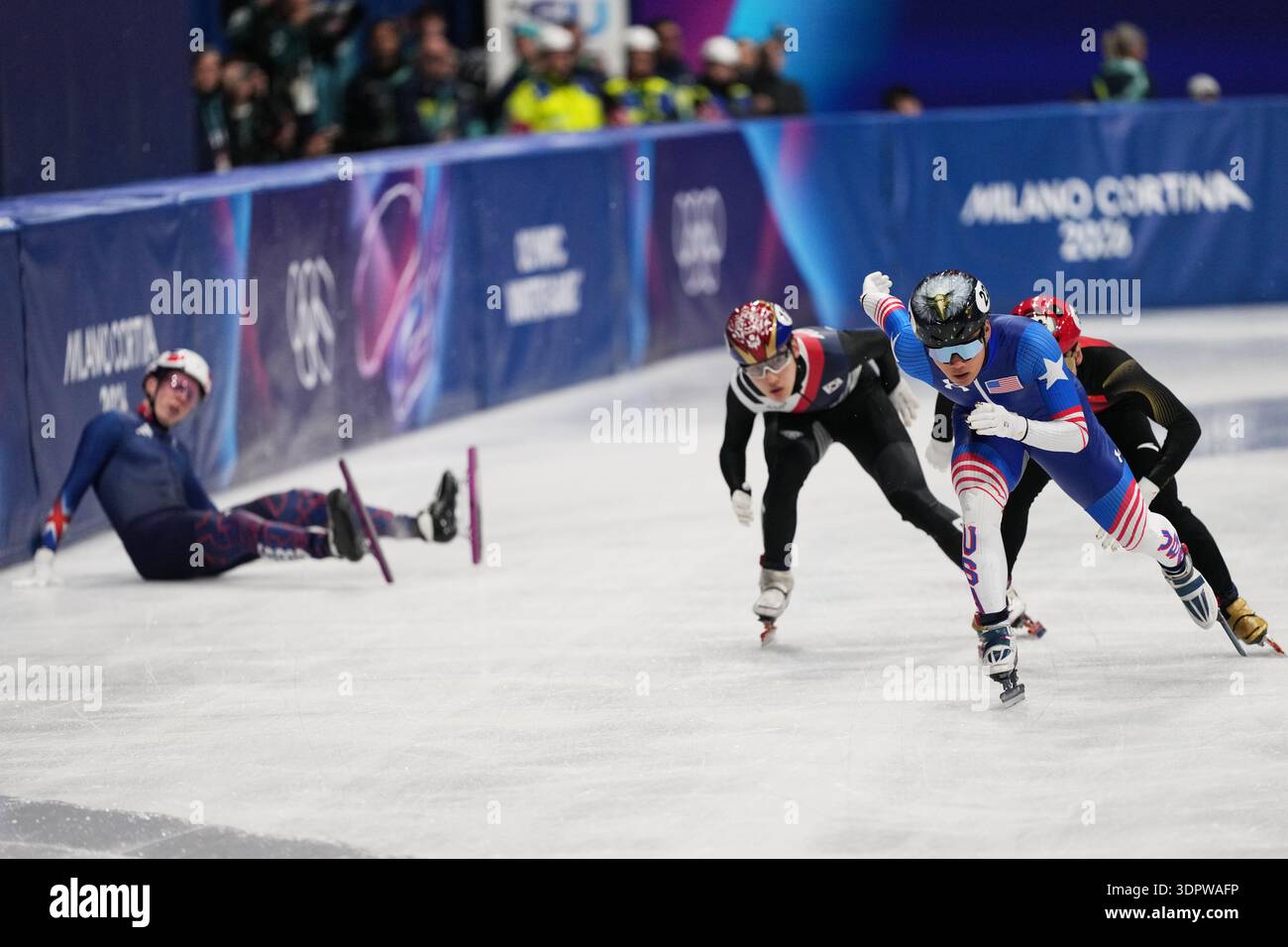 Niall Treacy of Britain, left, crashes out as Andrew Heo of the United ...