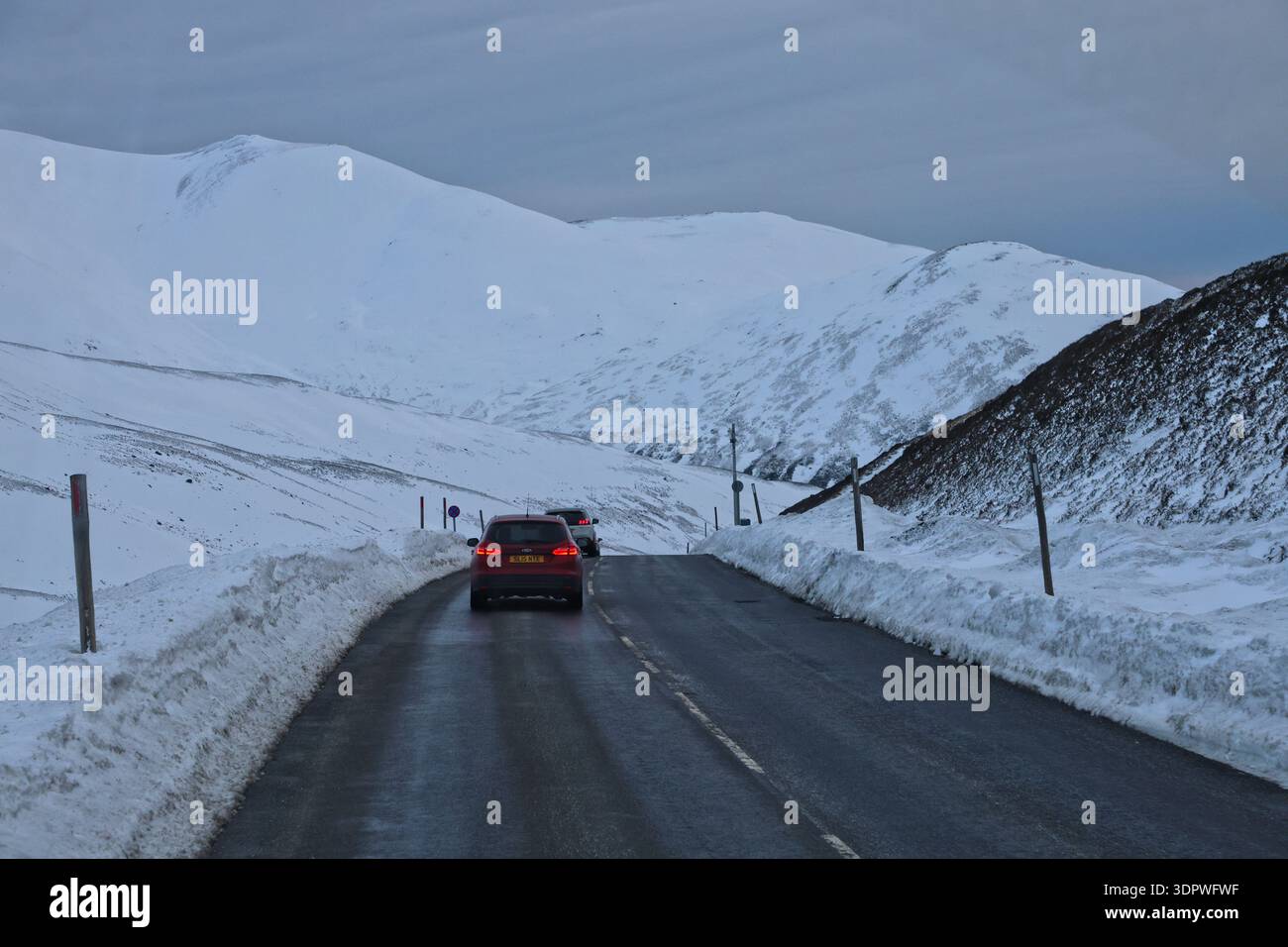 View through windscreen of bus travelling on A93 between Braemar and ...