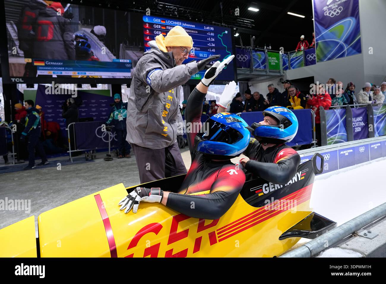 Germany's Johannes Lochner, front, and Georg Fleischhauer, rear, arrive ...