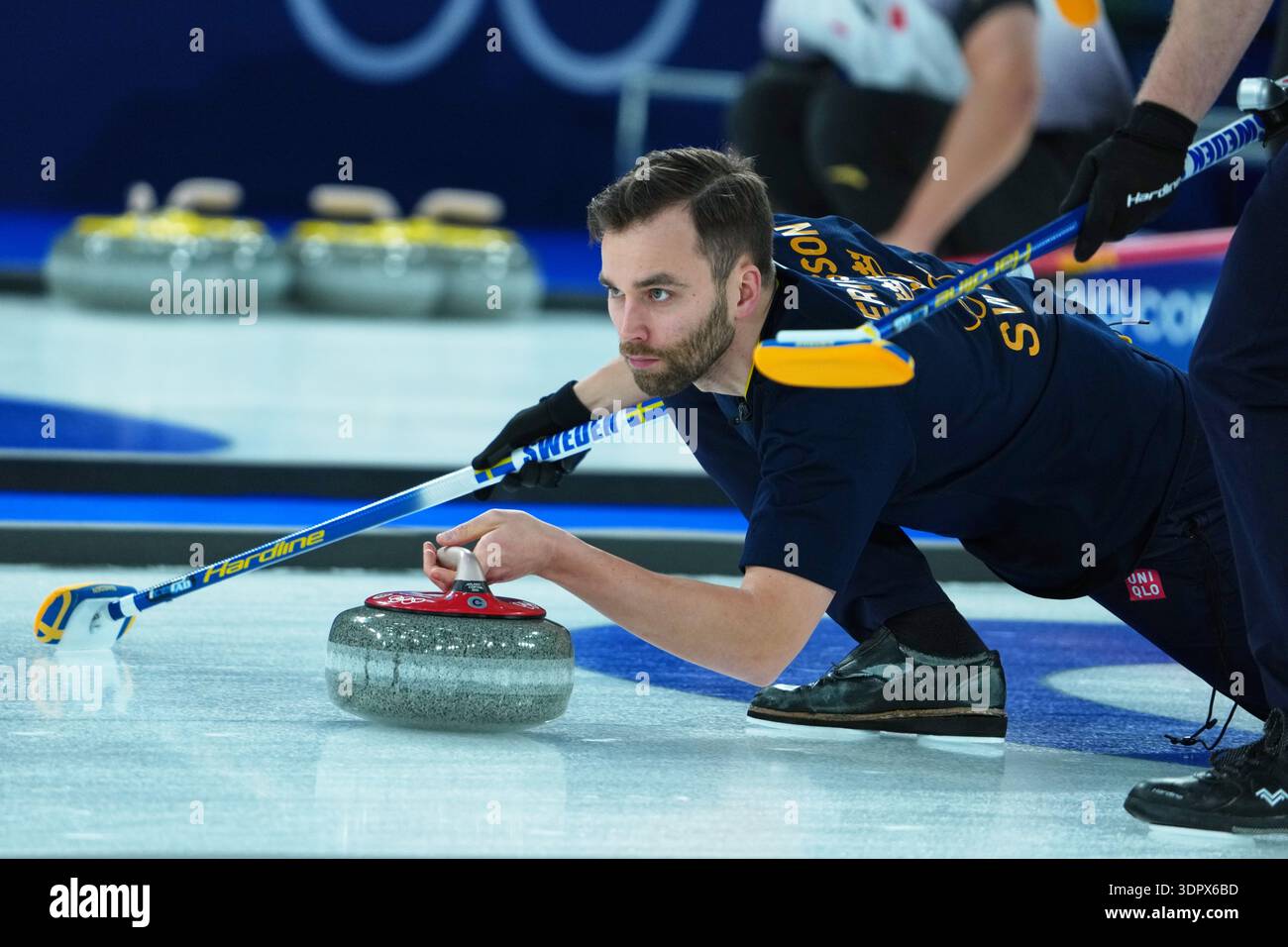 Sweden's Oskar Eriksson in action during the men's curling round robin ...