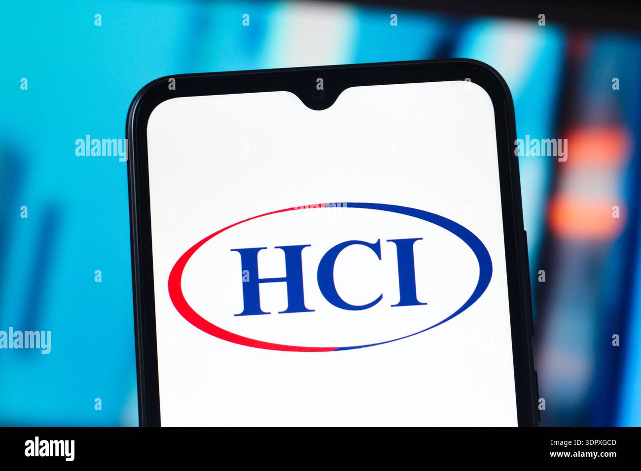 In this photo illustration, the HCI Group logo is seen displayed on a ...