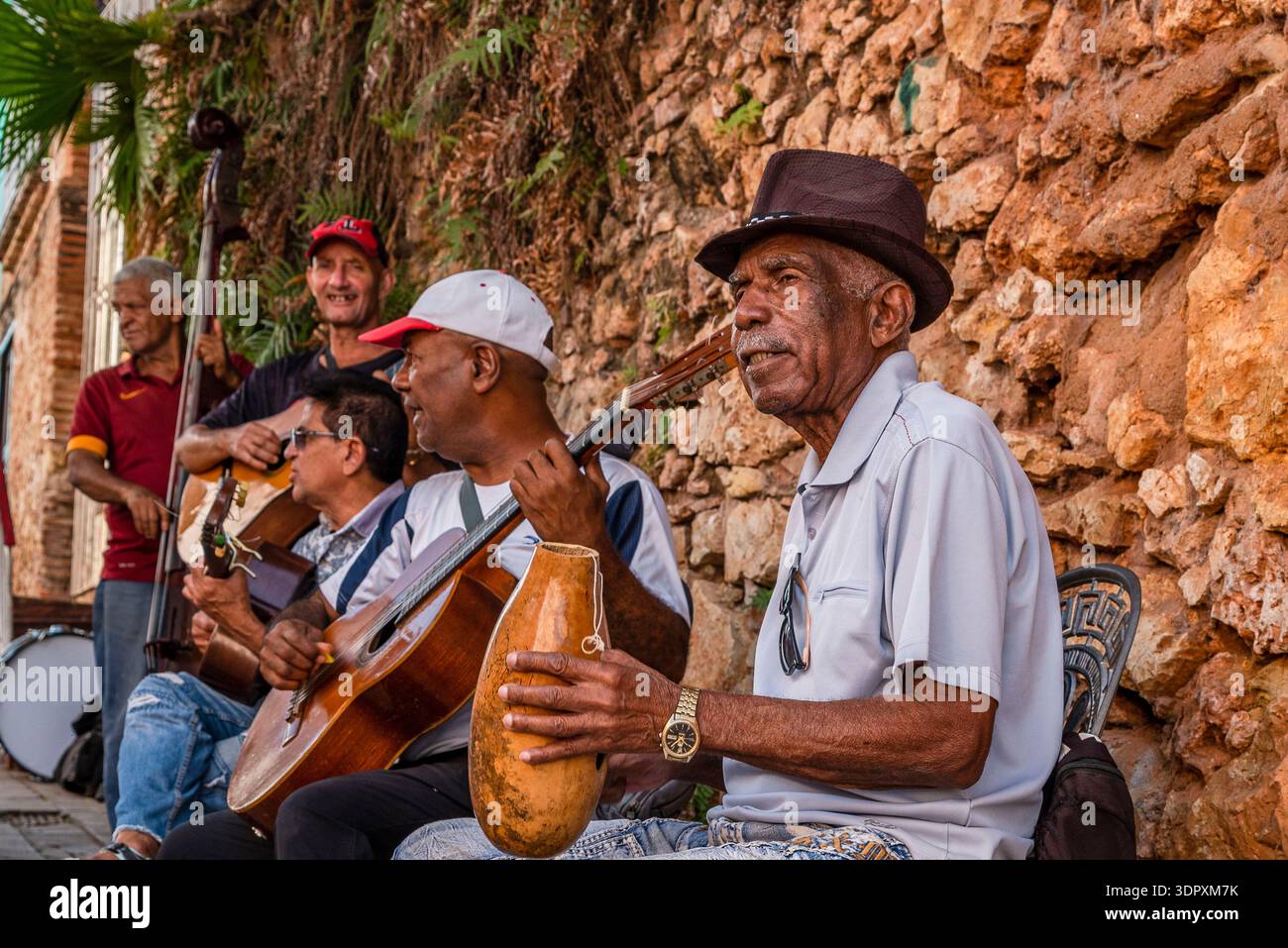 Cuban musicians performing traditional music on a street in Trinidad ...