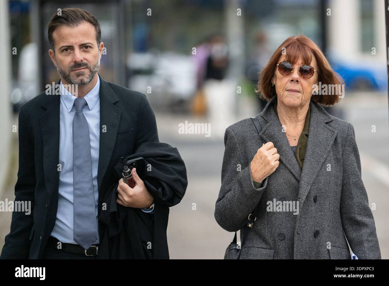 File photo - Gisele Pelicot arrives with her lawyer Stephane Babonneau ...