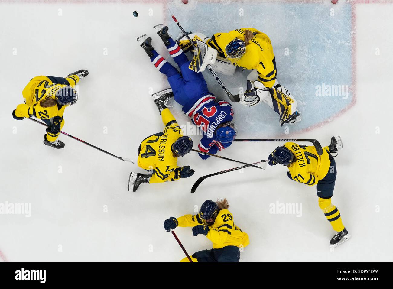 United States' Alex Carpenter (25) lays on the ice during a women's ice ...