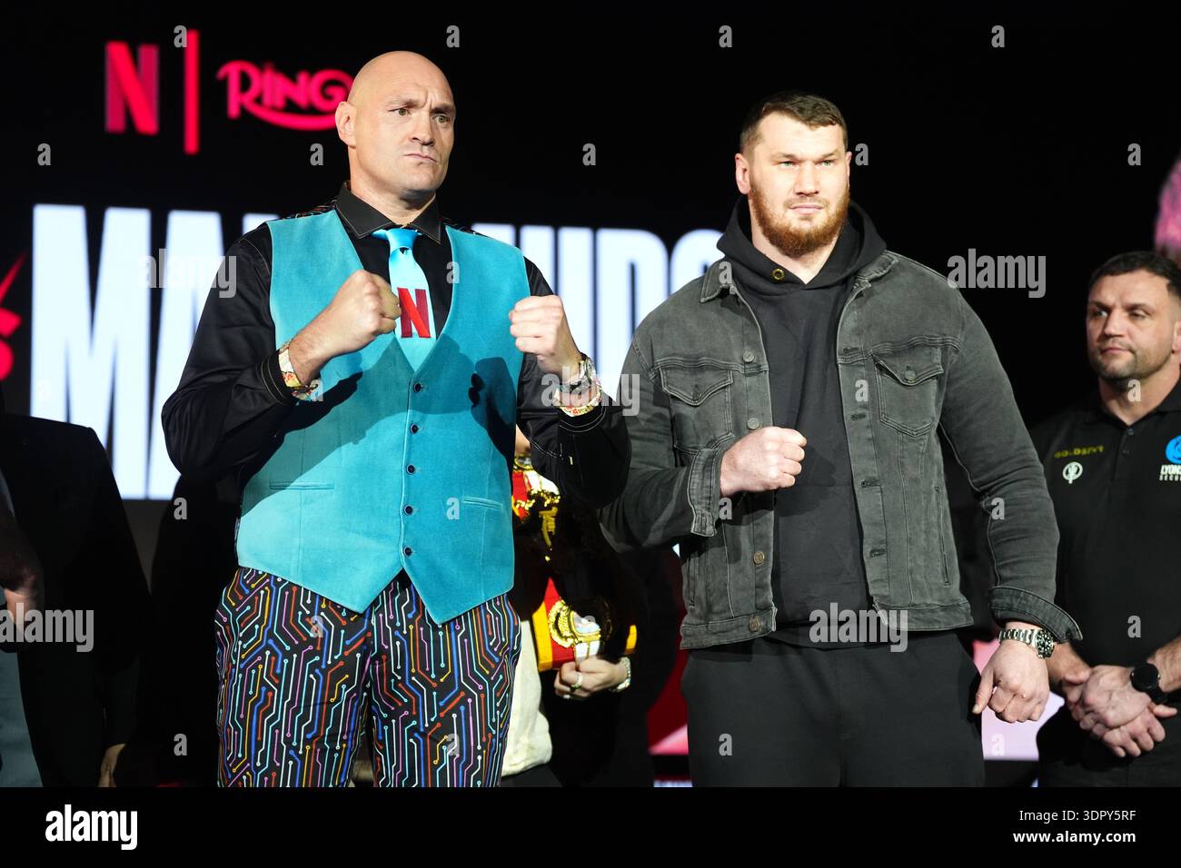Tyson Fury (left) and Arslanbek Makhmudov face off during a press ...