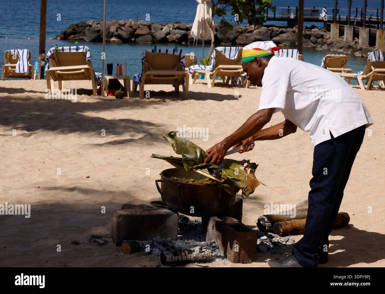 Chief cooking on beach for Independence Day at Sandals , Grenada on ...