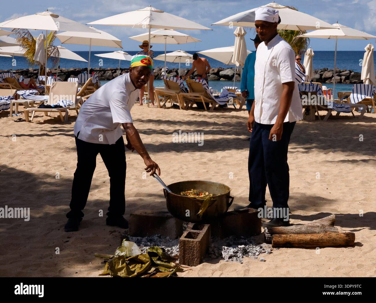 Chief cooking on beach for Independence Day at Sandals , Grenada on ...