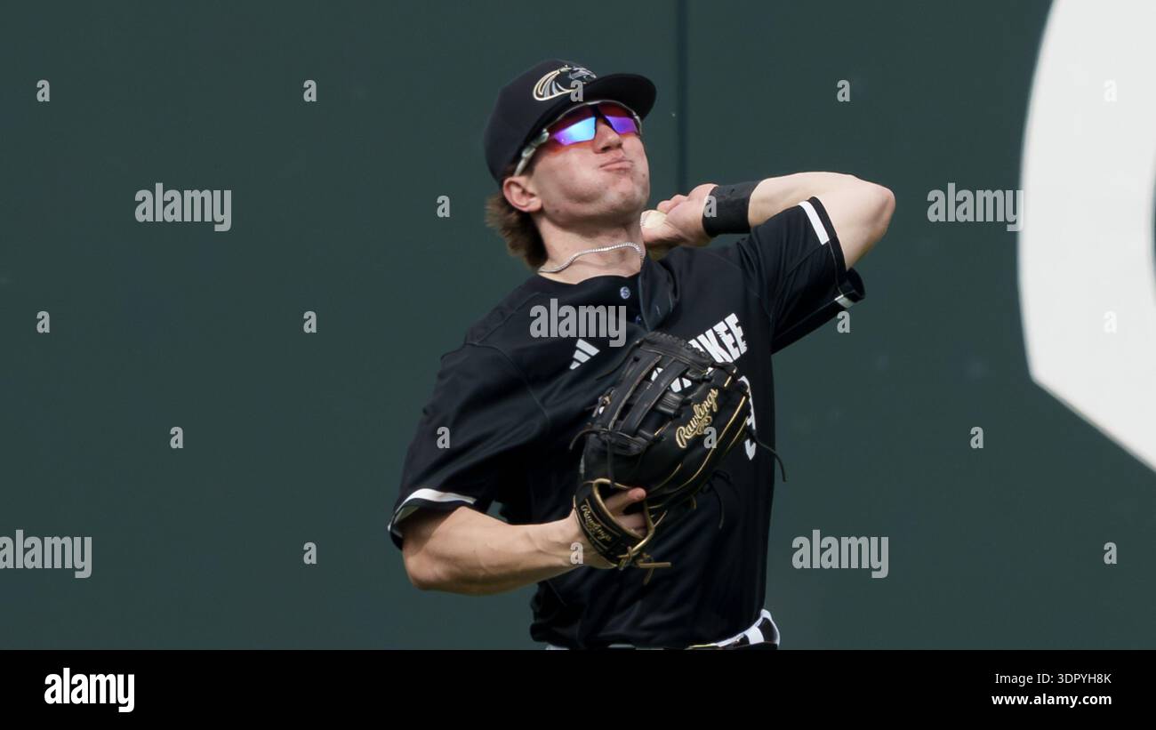 Milwaukee outfielder Cade Palkowski (9) throws during an NCAA baseball ...