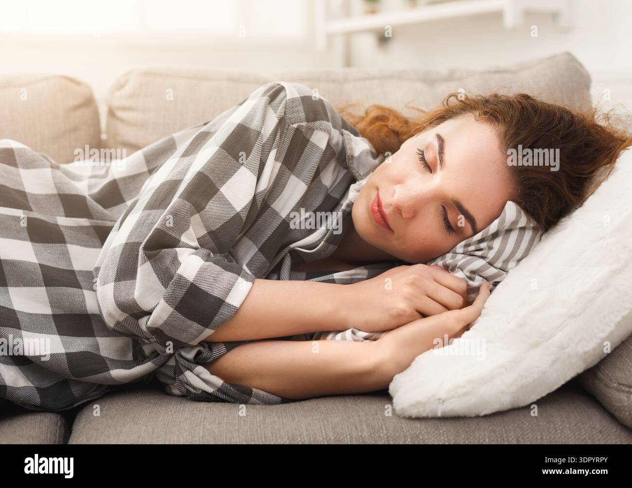 Woman sleeping peacefully in sunlight hi-res stock photography and ...