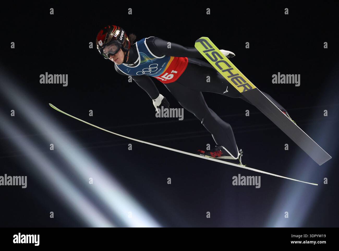 NIKAIDO Ren of Team Japan soars through the air during the second round ...