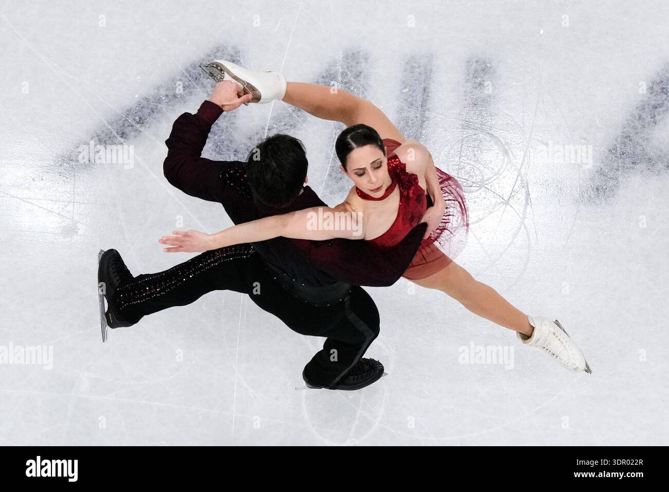 Deanna Stellato-Dudek and Maxime Deschamps of Canada compete during the ...