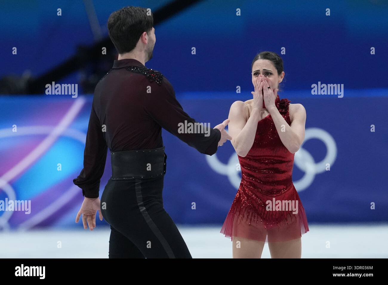 Canada's Deanna Stellato-Dudek and Maxime Deschamps react after their ...