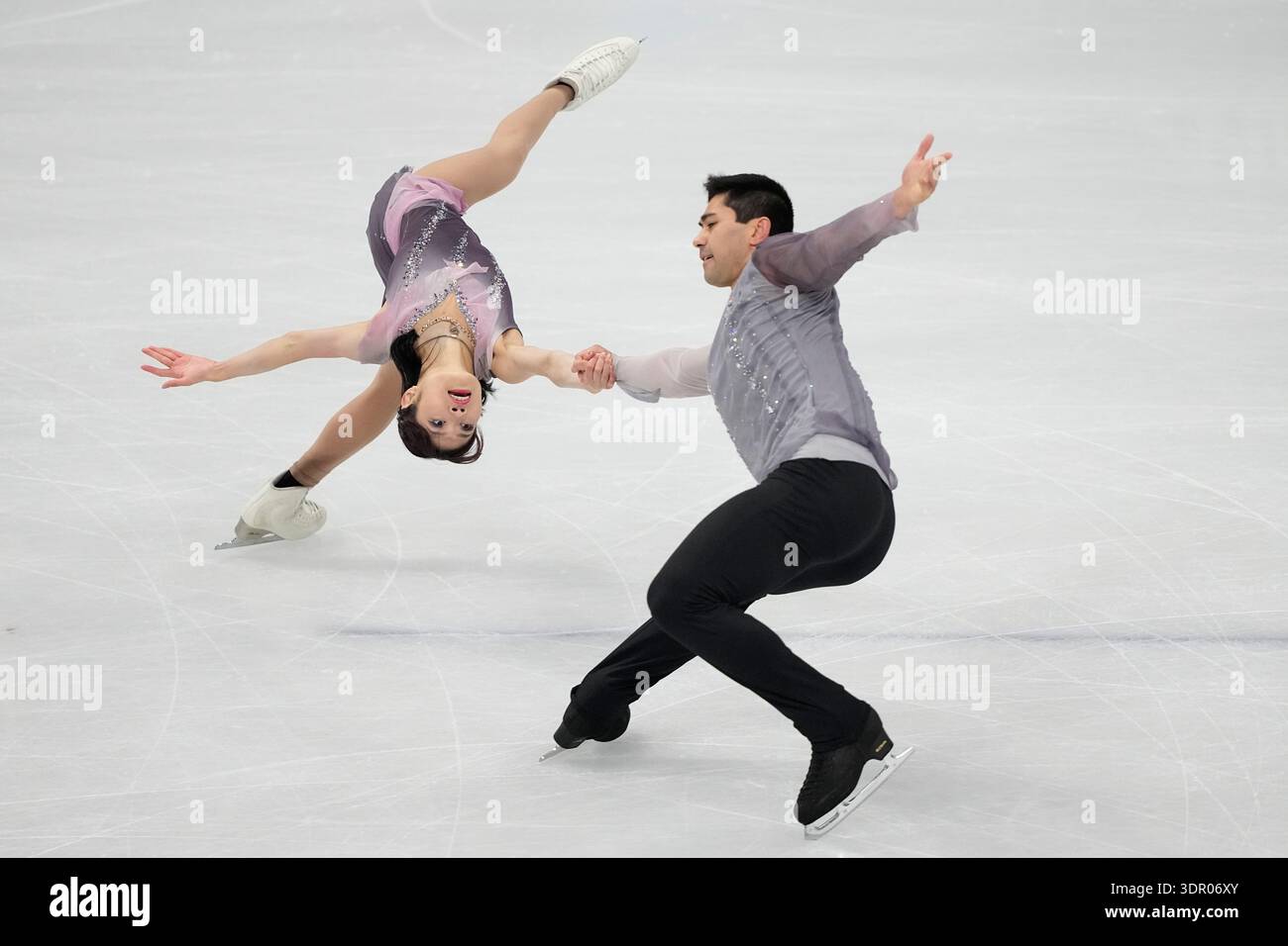 Emily Chan and Spencer Akira Howe of the United States compete during ...