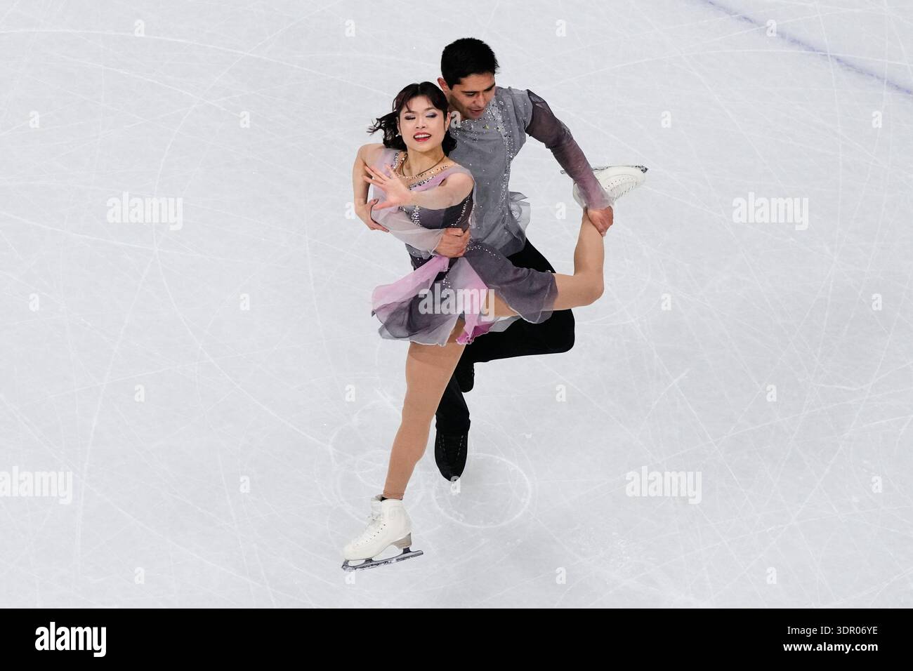 Emily Chan and Spencer Akira Howe of the United States compete during ...