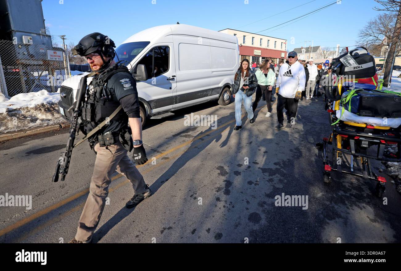 Witnesses follow police outside of the Lynch Arena in Pawtucket, R.I ...