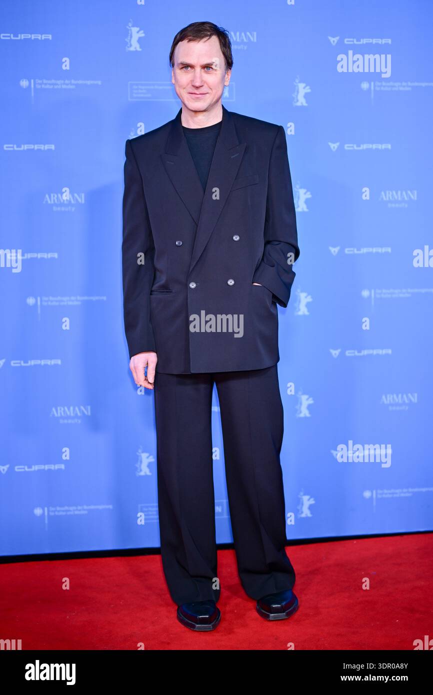 16 February 2026, Berlin: Lars Eidinger, actor, stands on the red ...