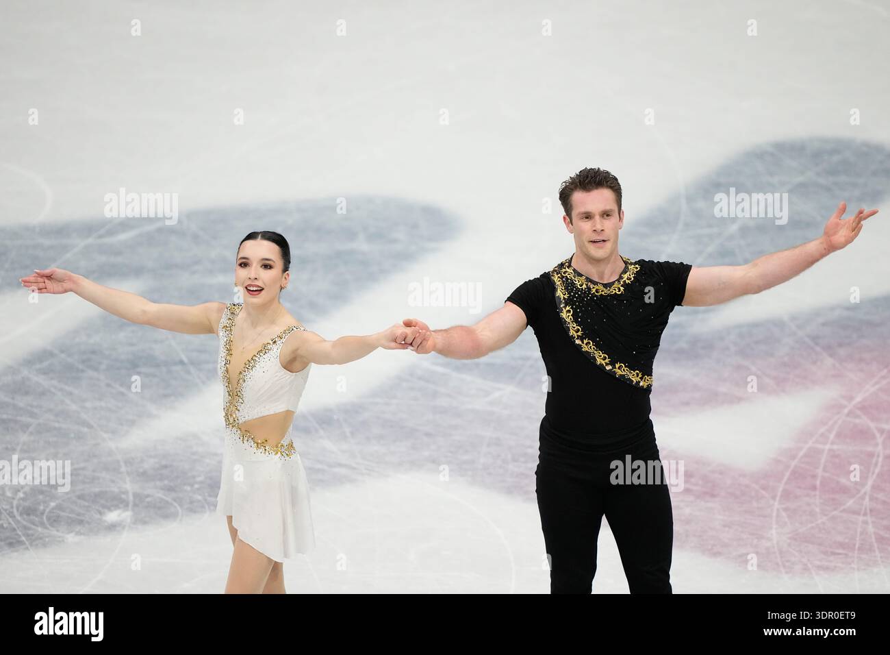Lia Pereira and Trennt Michaud of Canada compete during the pairs ...