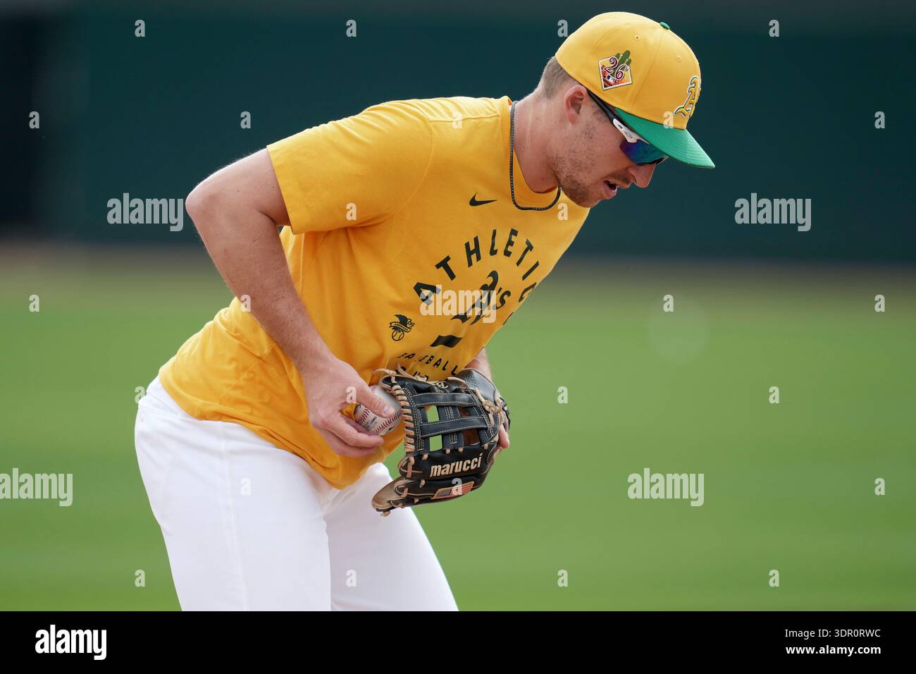 Athletics third baseman Brett Harris works out during spring training ...