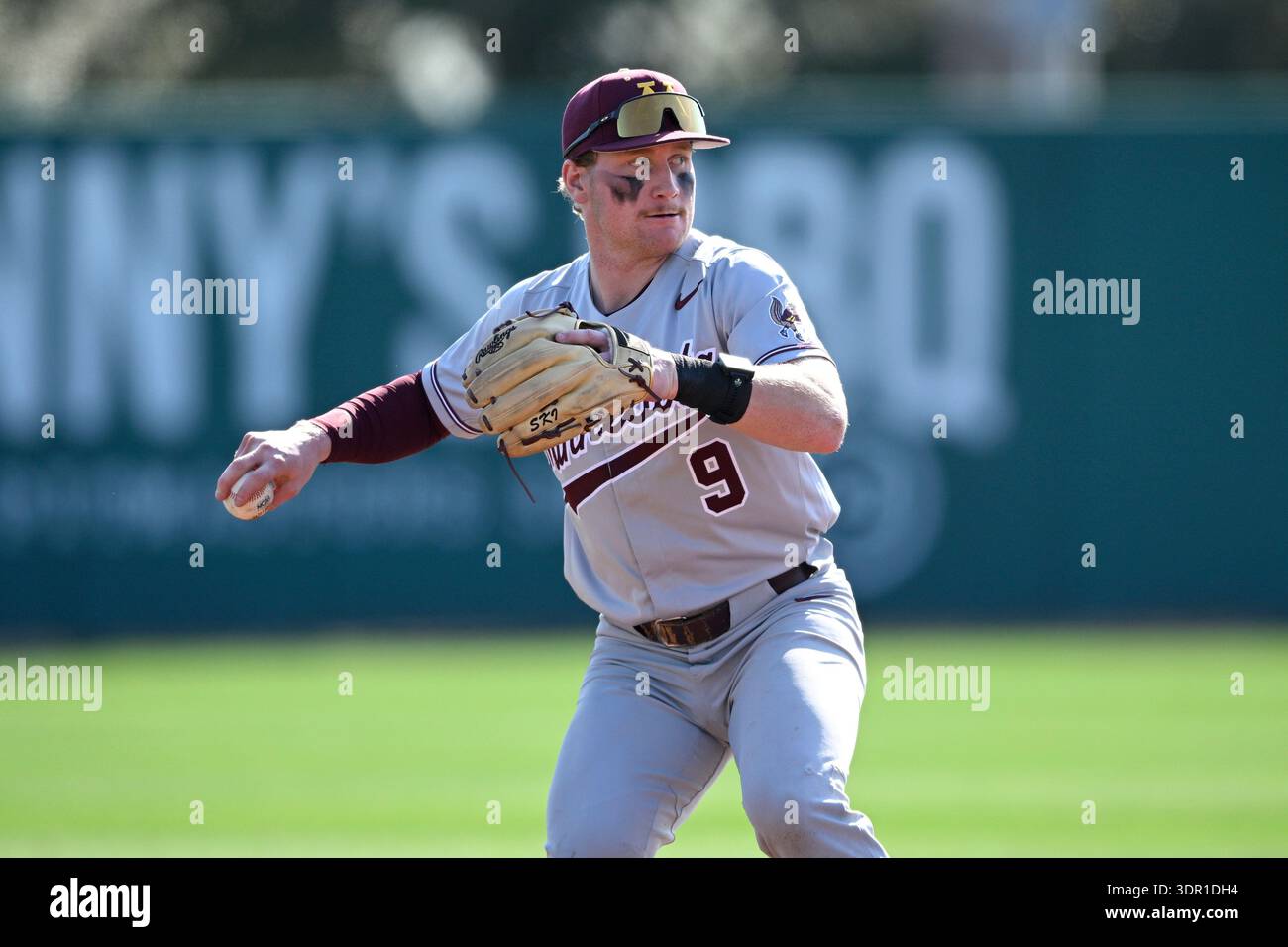 Minnesota infielder Davis Hamilton (9) throws during an NCAA college ...