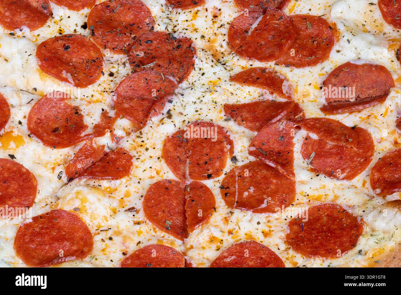 Melty cheese pepperoni pizza closeup ovenbaked, bubbling mozzarella ...