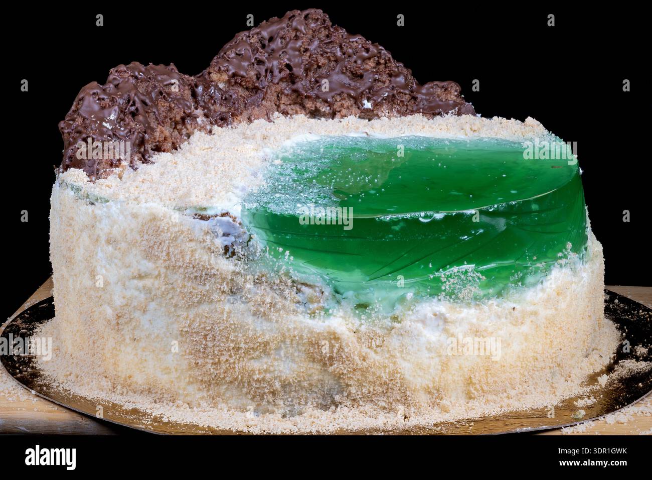 Homemade cake experimental green jelly center with chocolate mound ...