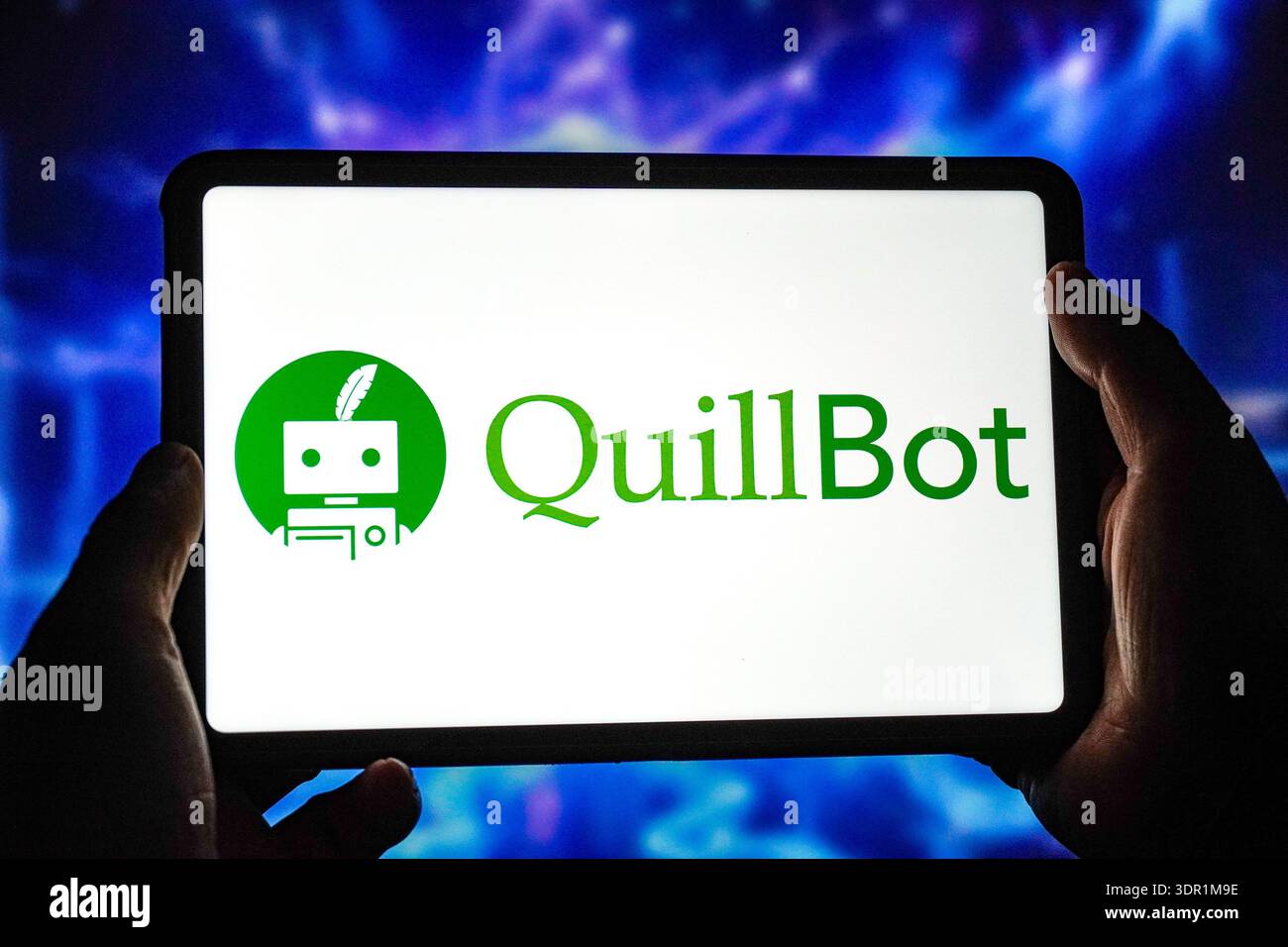 In this photo illustration, the QuillBot logo is displayed on the ...