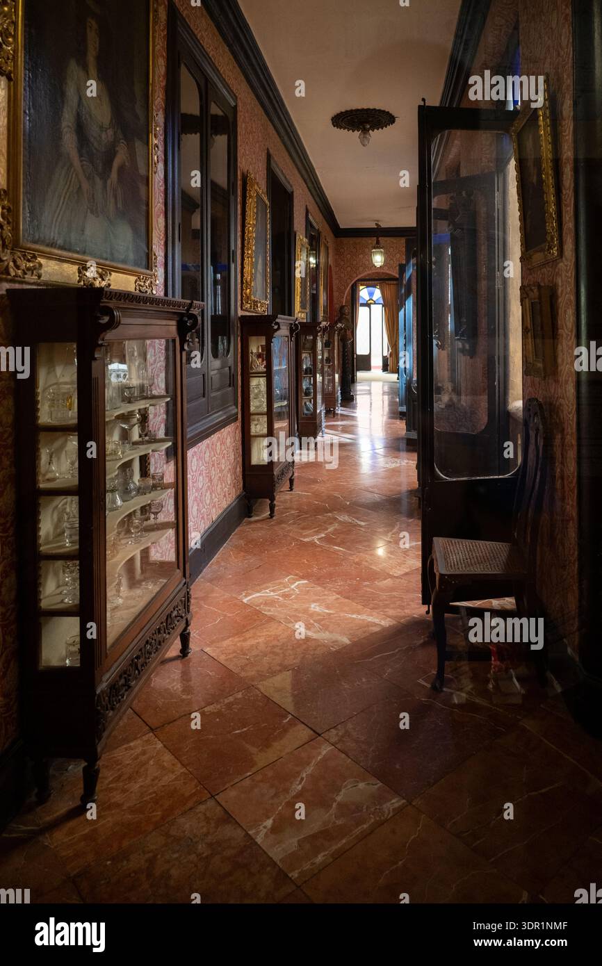 Sevilla, Spain 25 Sep 23: Long corridor with glass display cabinets ...