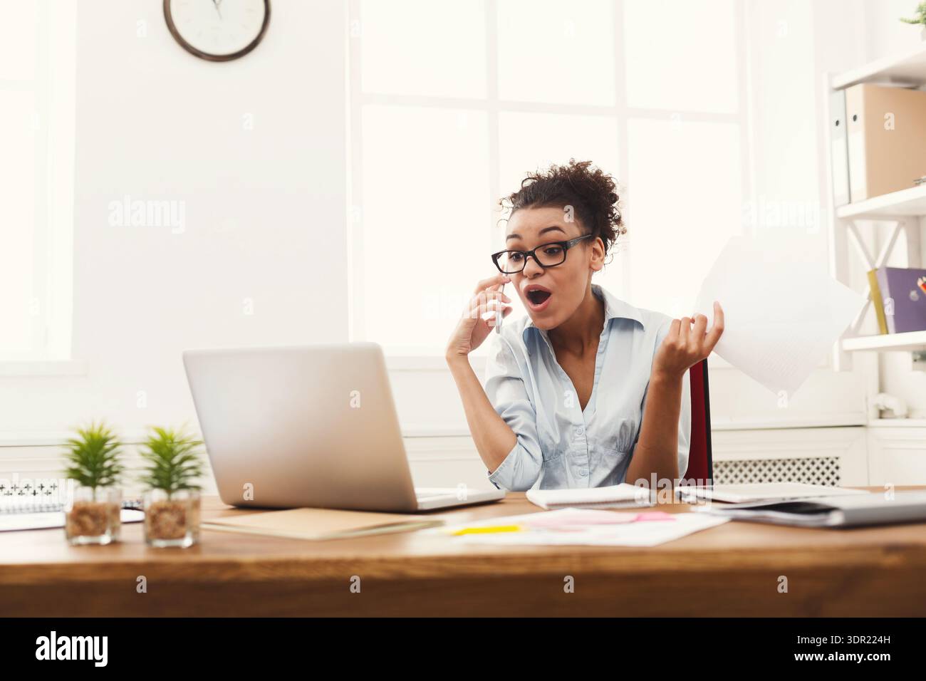 Woman reacts surprise working hi-res stock photography and images - Alamy