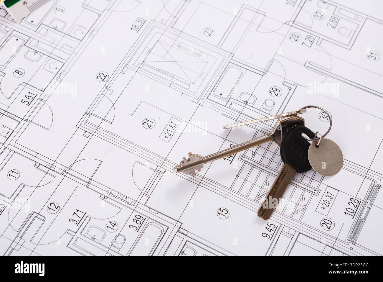 Keys Placed on a Floor Plan With Detailed Layouts and Measurements of ...