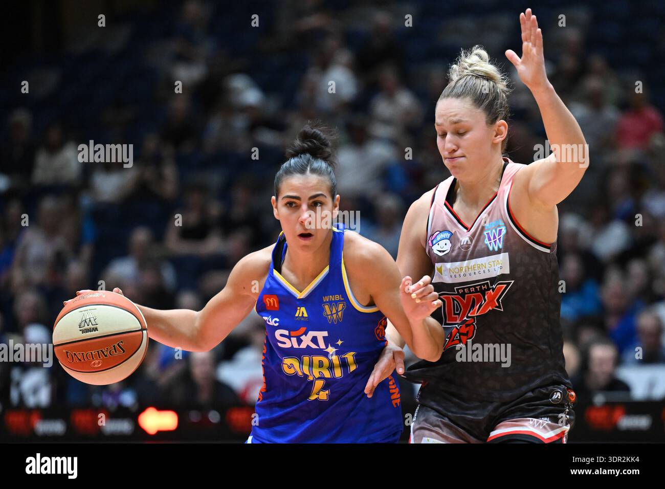 Megan McConnell of Bendigo Spirit (left) in action during the WNBL ...