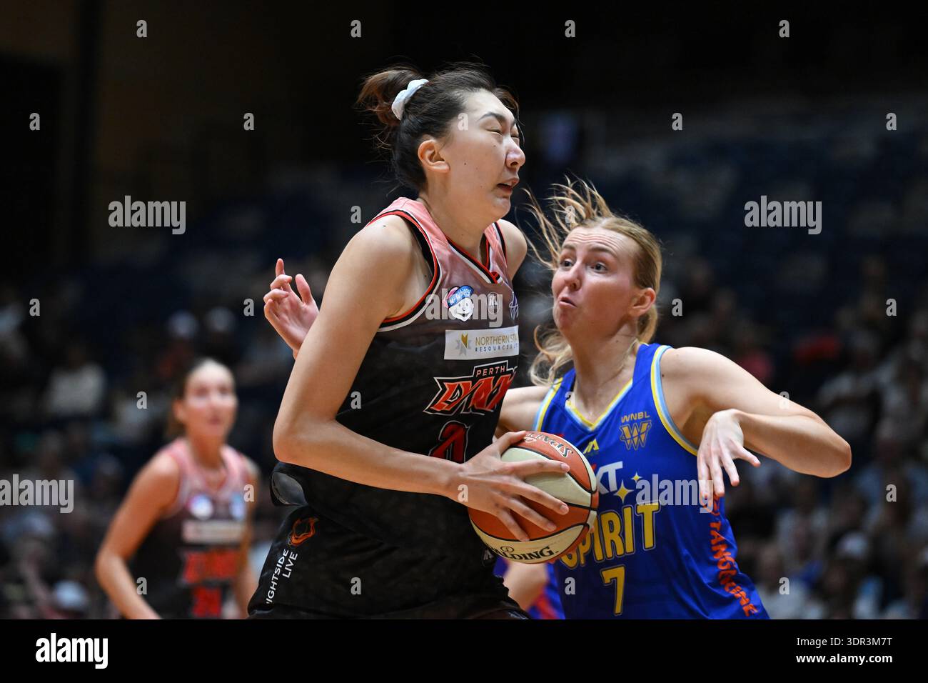 Han Xu of Perth Lynx (centre) in action during the WNBL Finals series ...