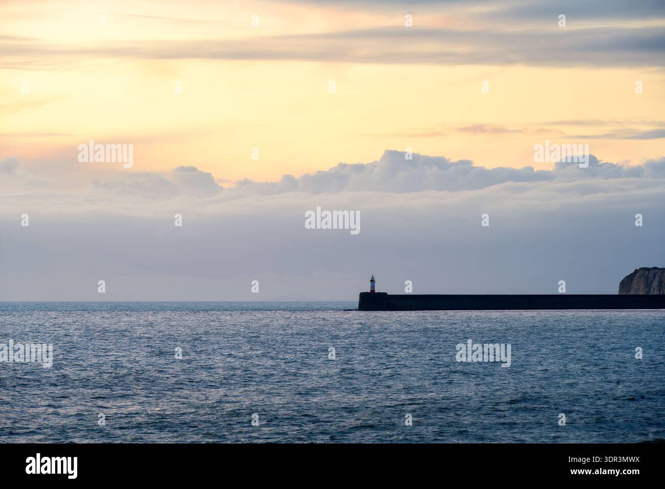 Newhaven harbour jetty and lighthouse on a cloudy winter day, East ...