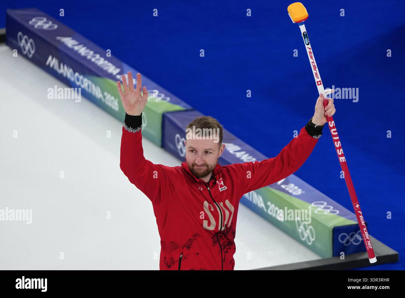 Switzerland's Yannick Schwaller reacts during the men's curling round ...