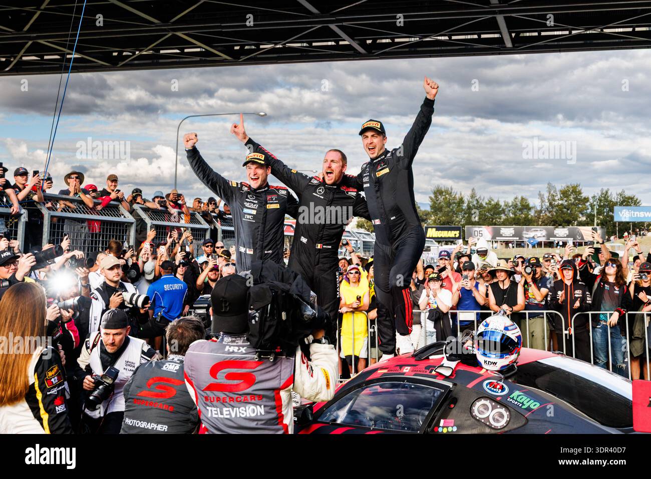 Maro Engel (L), Maxime Martin (C) and Mikael Grenier (R) of Mercedes ...