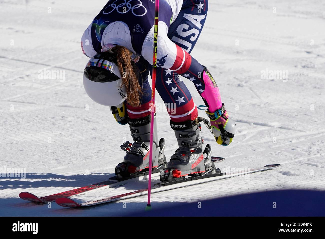 United States' Paula Moltzan unlatches her boots at the finish area of ...