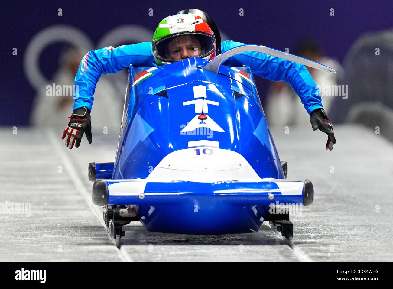 Italy's Simona de Silvestro, front, starts for a two women bobsled ...