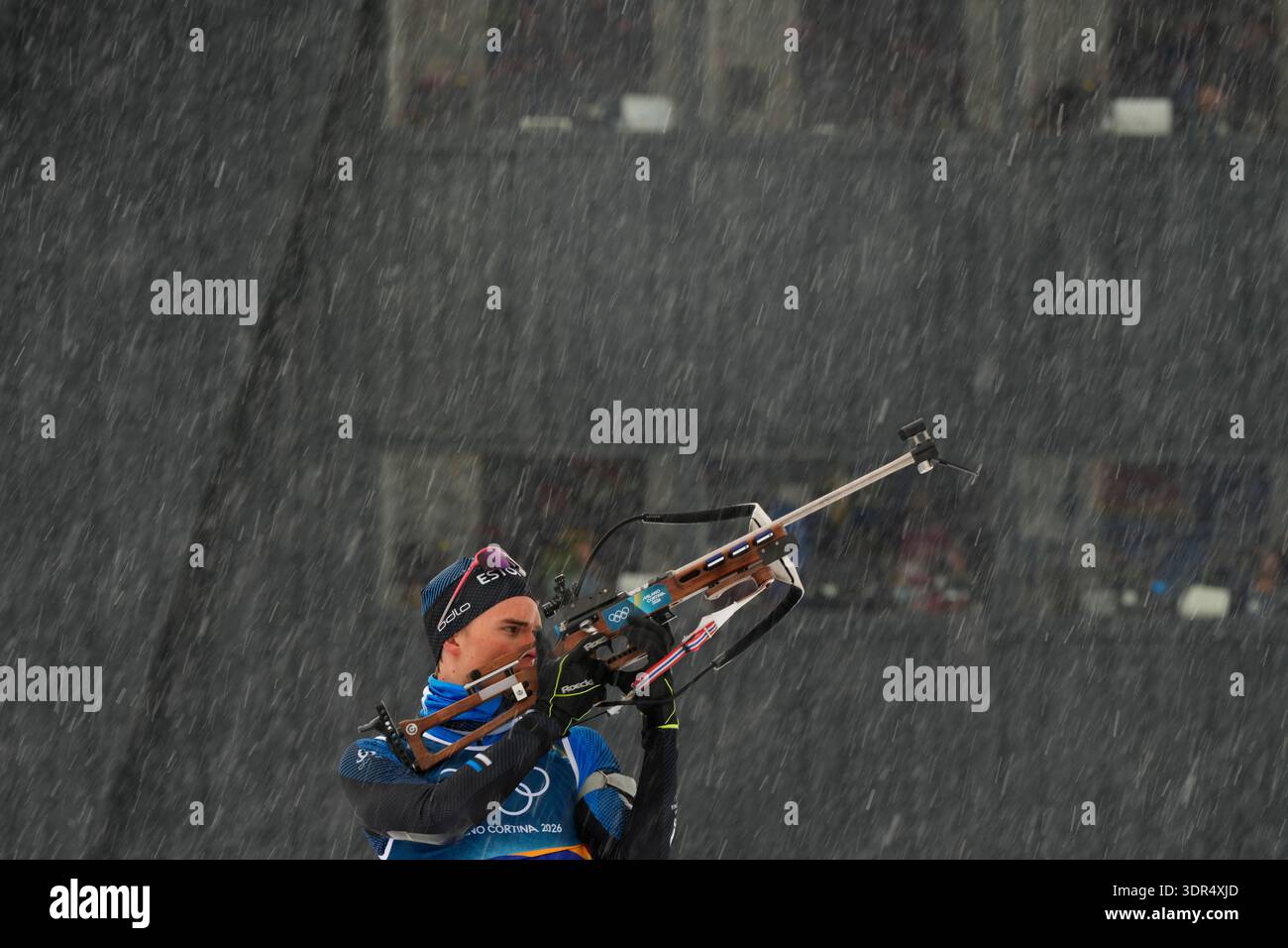 Jakob Kulbin, of Estonia, shoots ahead of the men's 4x7.5-kilometer ...