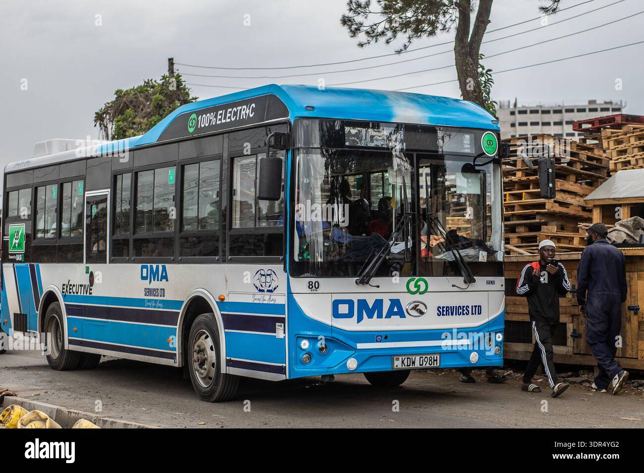 A battery electric bus drives through the streets of Nairobi, Kenya ...