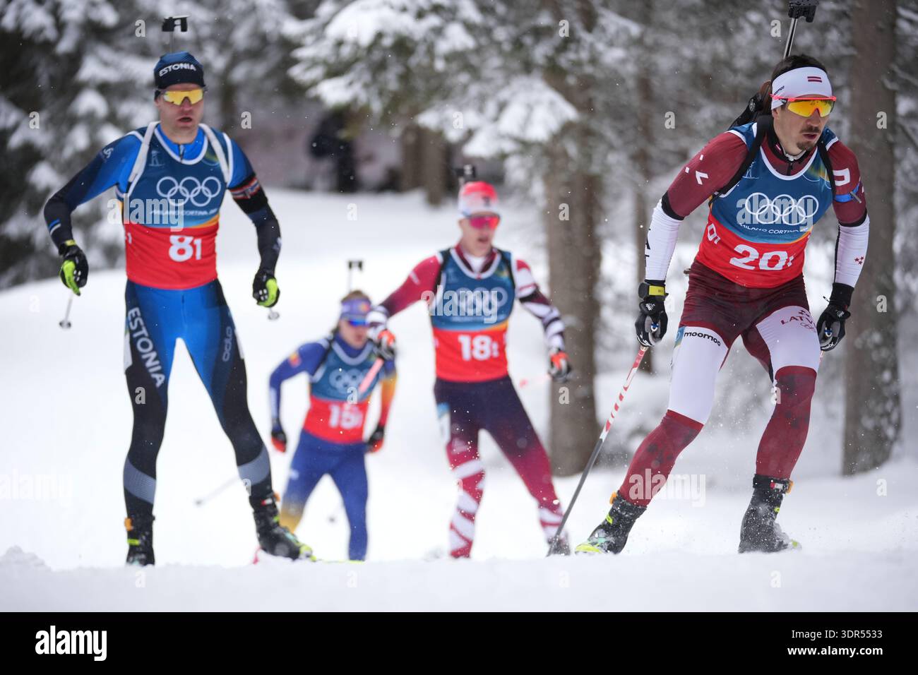 Andrejs Rastorgujevs, of Latvia, right, competes in the men's 4x7.5 ...