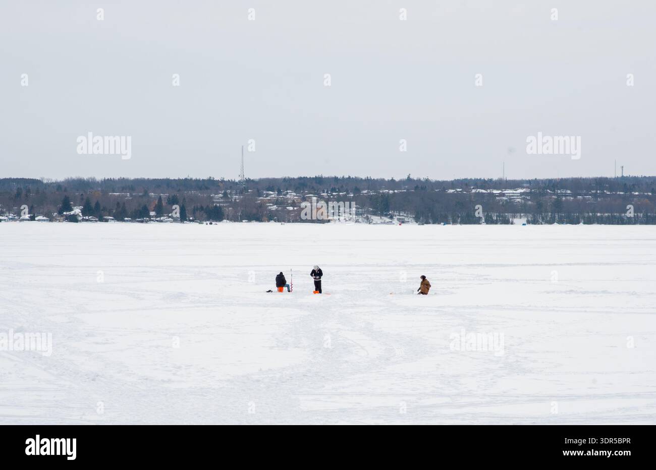 Ice Fishing on a Mild Winter Afternoon on Kempenfelt Bay Lake Simcoe ...