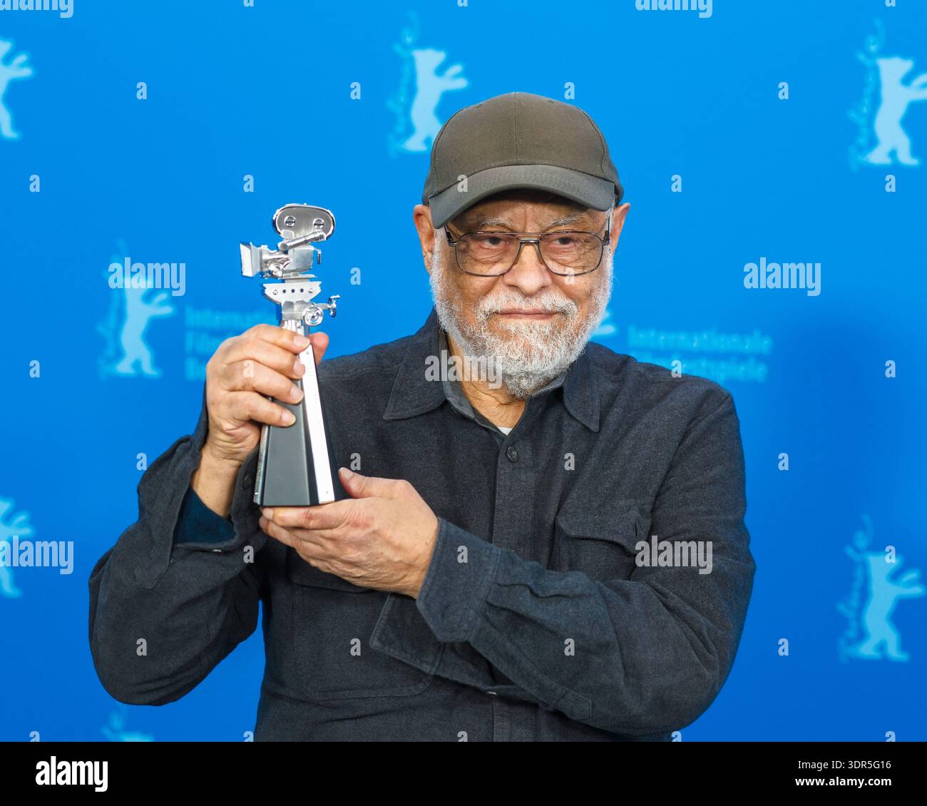 Haile Gerima poses with his award at the Photocall for Ethiopian ...