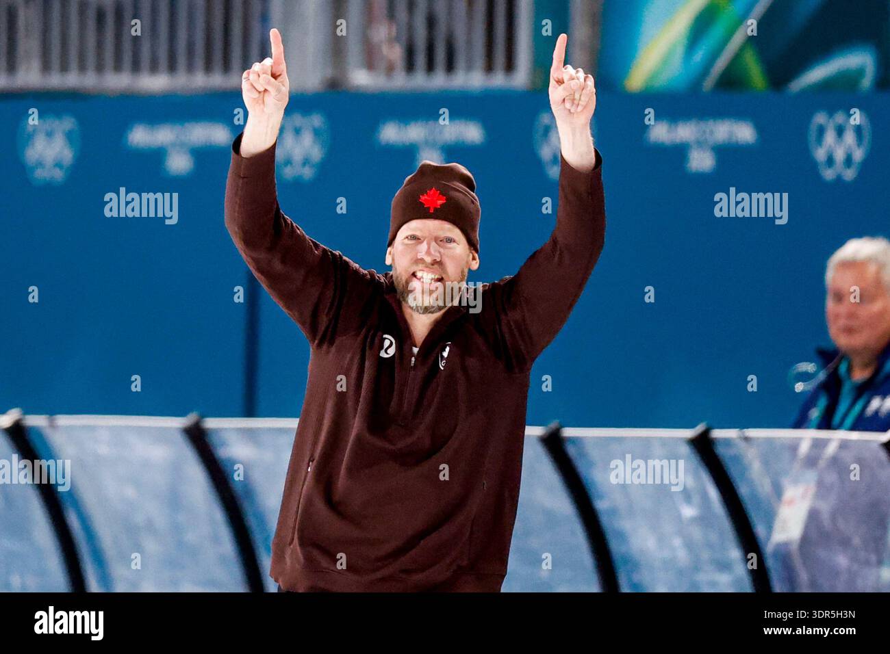 coach Remmelt Eldering of Canada celebrates after watching atheletes ...