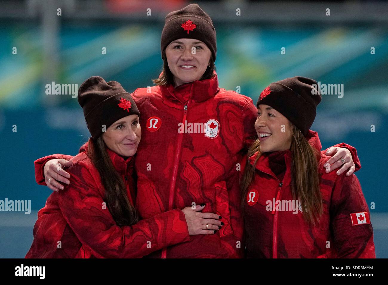 Team Canada with Ivanie Blondin, Isabelle Weidemann, center, and ...
