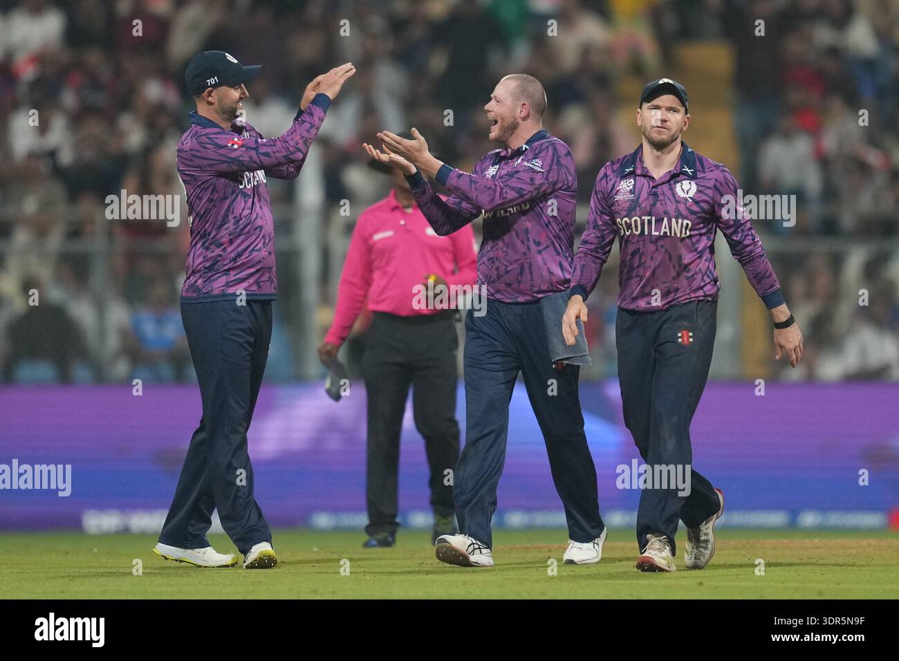 Scotland's Michael Leask celebrates the wicket of Nepal's captain Rohit ...