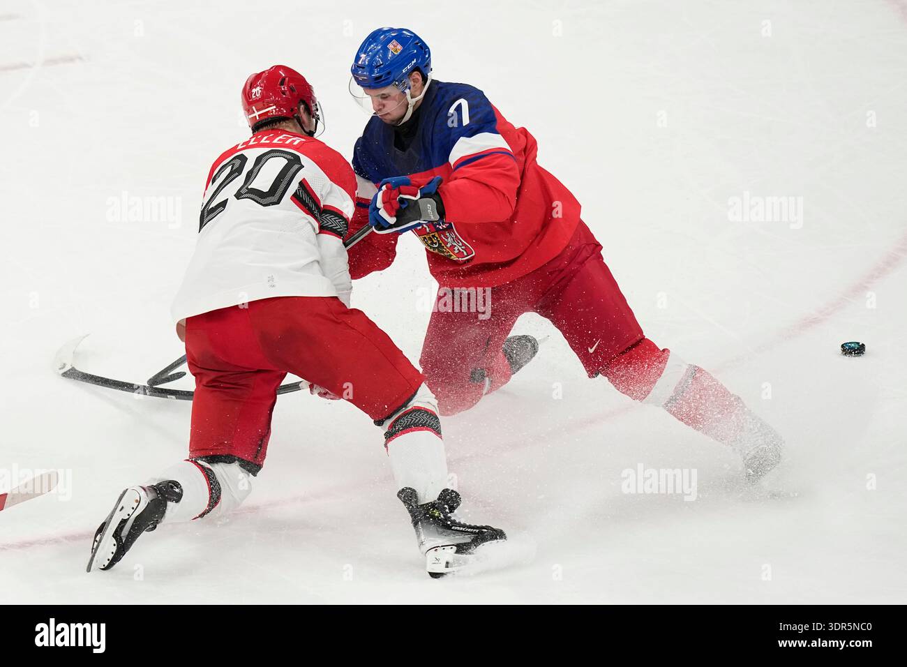 Denmark's Lars Eller (20) and Czechia's David Spacek (7) vie for the ...