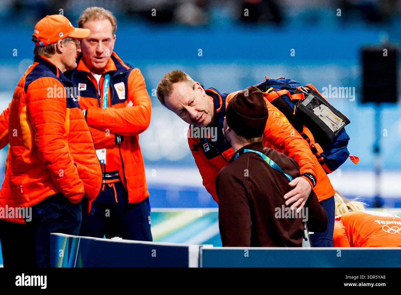 Erik Wink of TeamNL talks with coach Remmelt Eldering of Canada and ...