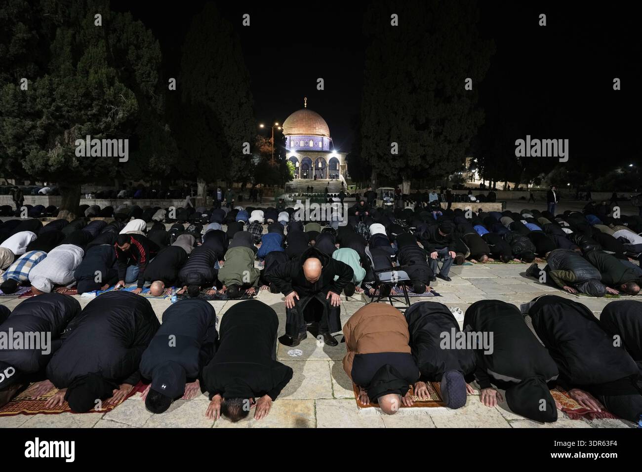 Muslim worshippers perform the evening Tarawih prayers during the holy ...