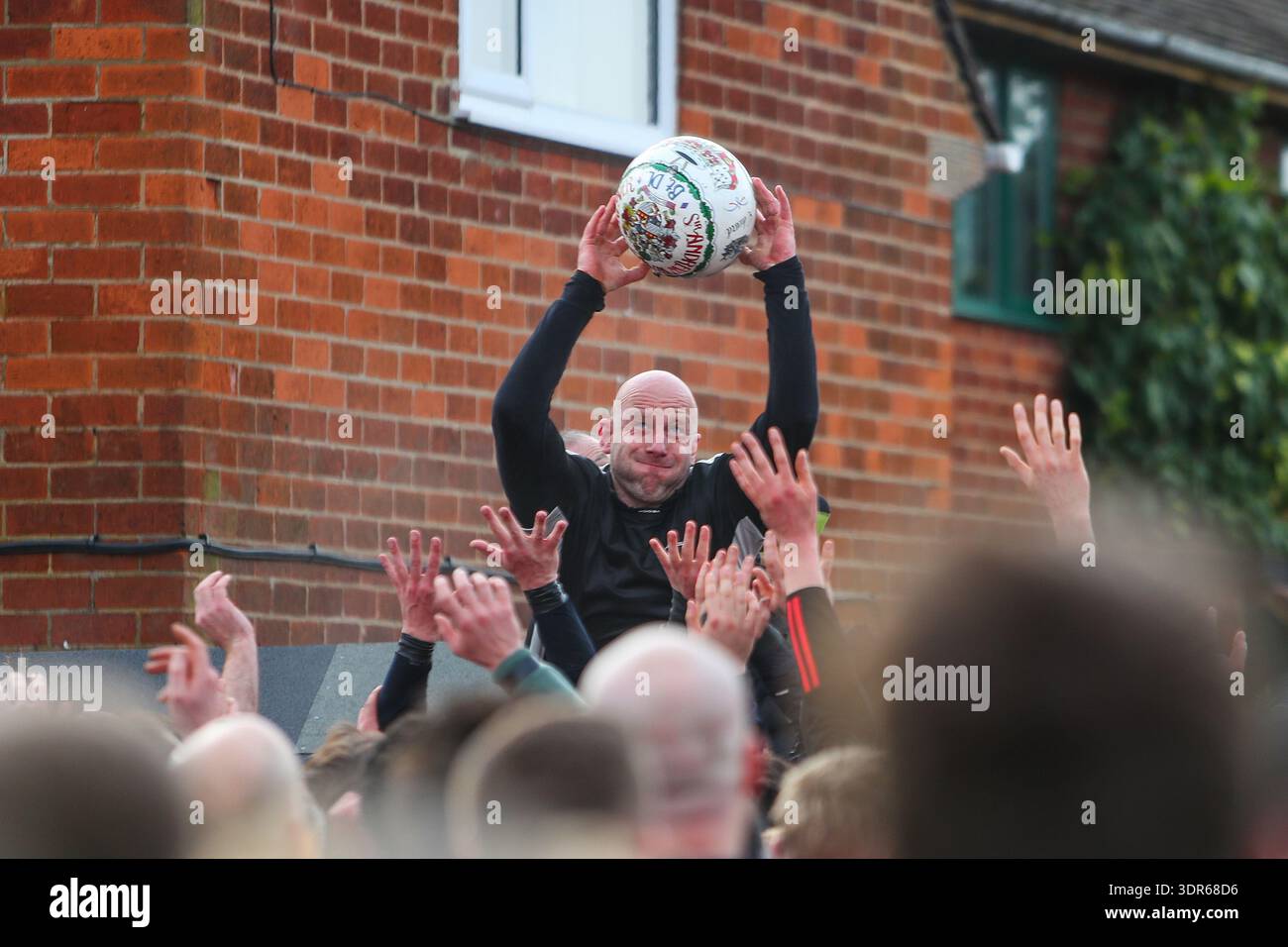 Ashbourne, United Kingdom. Players wrestle for possession during the ...